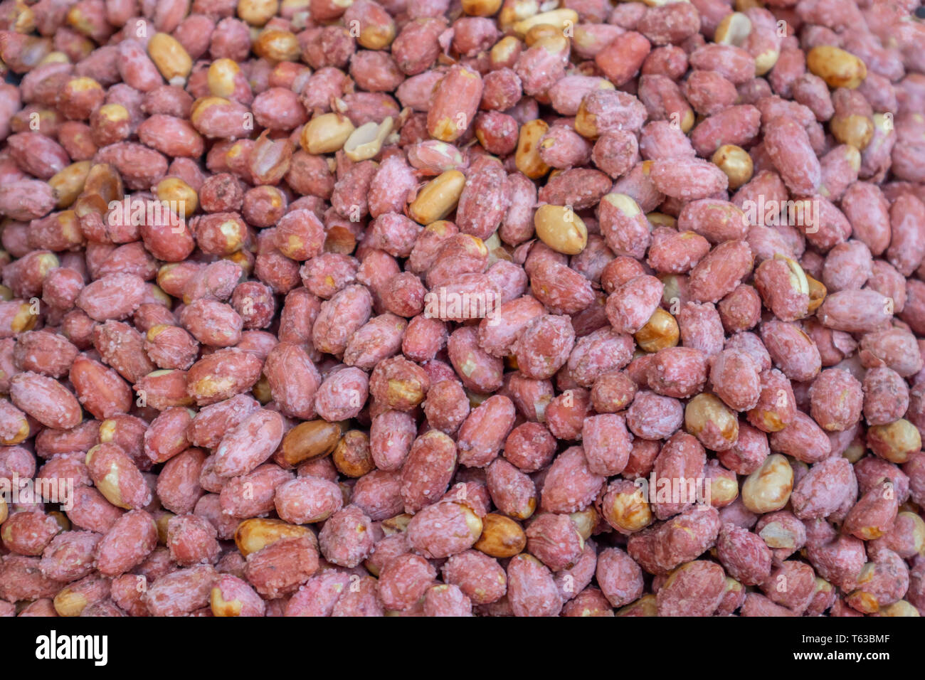 Peanuts snack salty. Red skin peanuts roasted and salted background ...