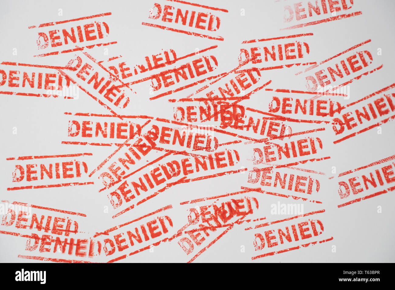 denied word stamp on white paper Stock Photo - Alamy