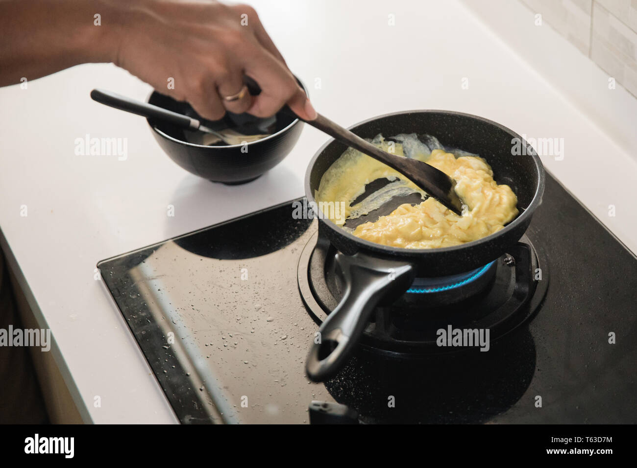 Hands preparing stir fry hi-res stock photography and images - Alamy