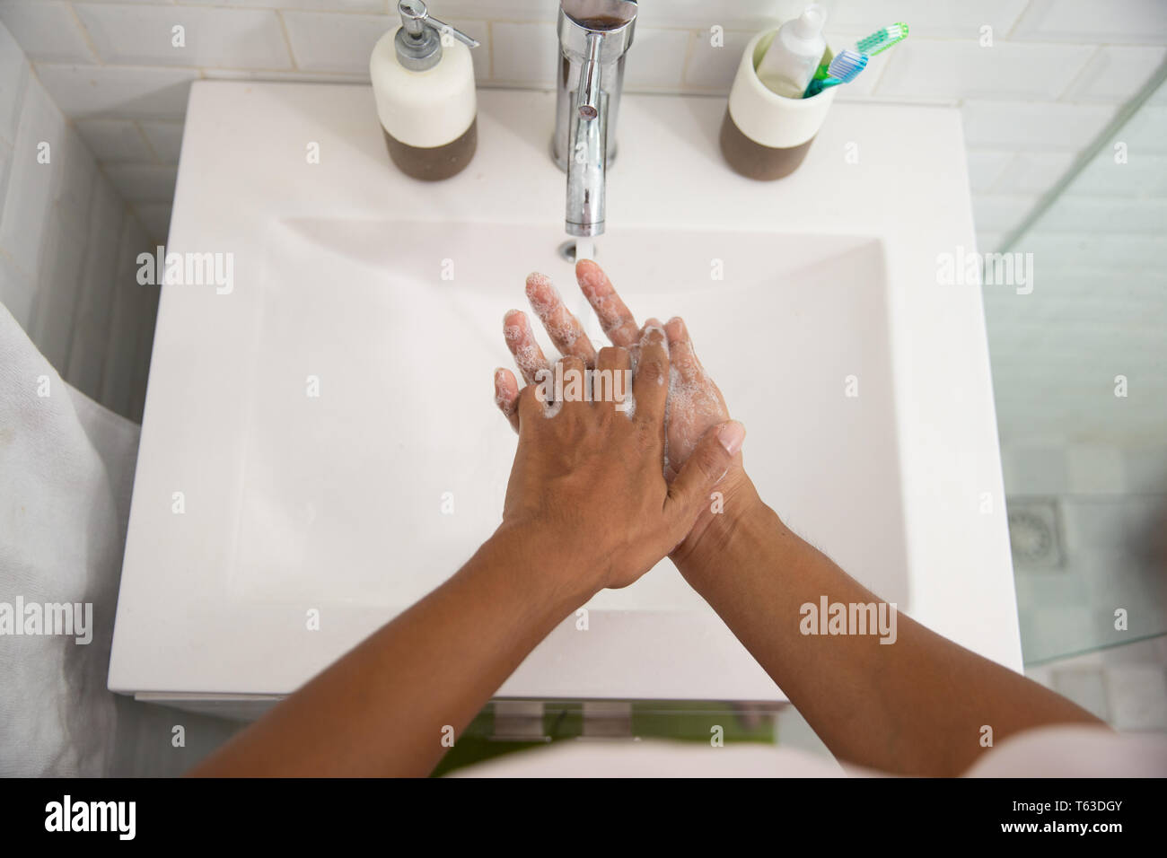 hand wash on basin using soap Stock Photo - Alamy