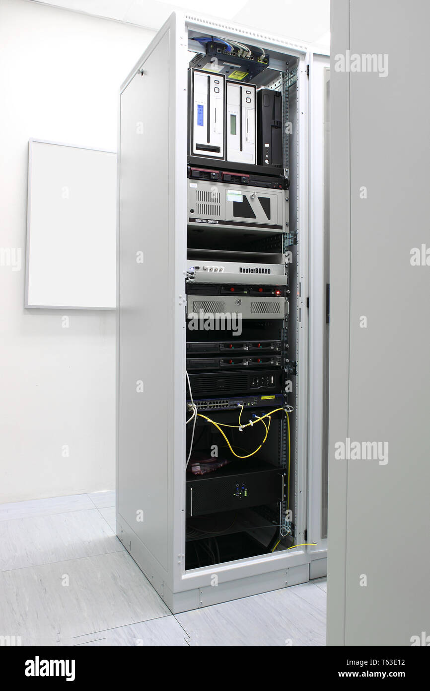 Rack with network equipment in technology telehouse room Stock Photo ...