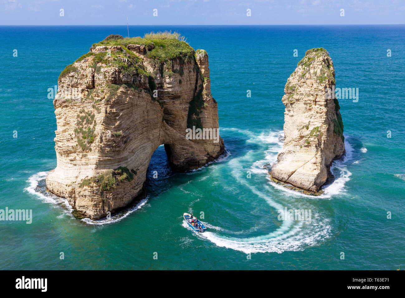 Rouche rocks in Beirut, Lebanon in the sea during daytime. Pigeon Rocks ...