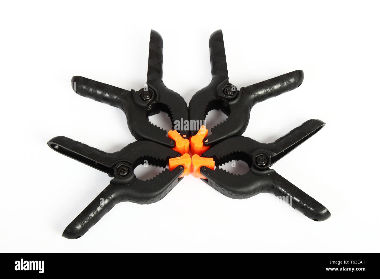 plastic clamps composition on white background Stock Photo - Alamy