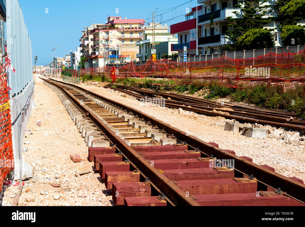 Construction of a new railway line at a city station. The rails are ...