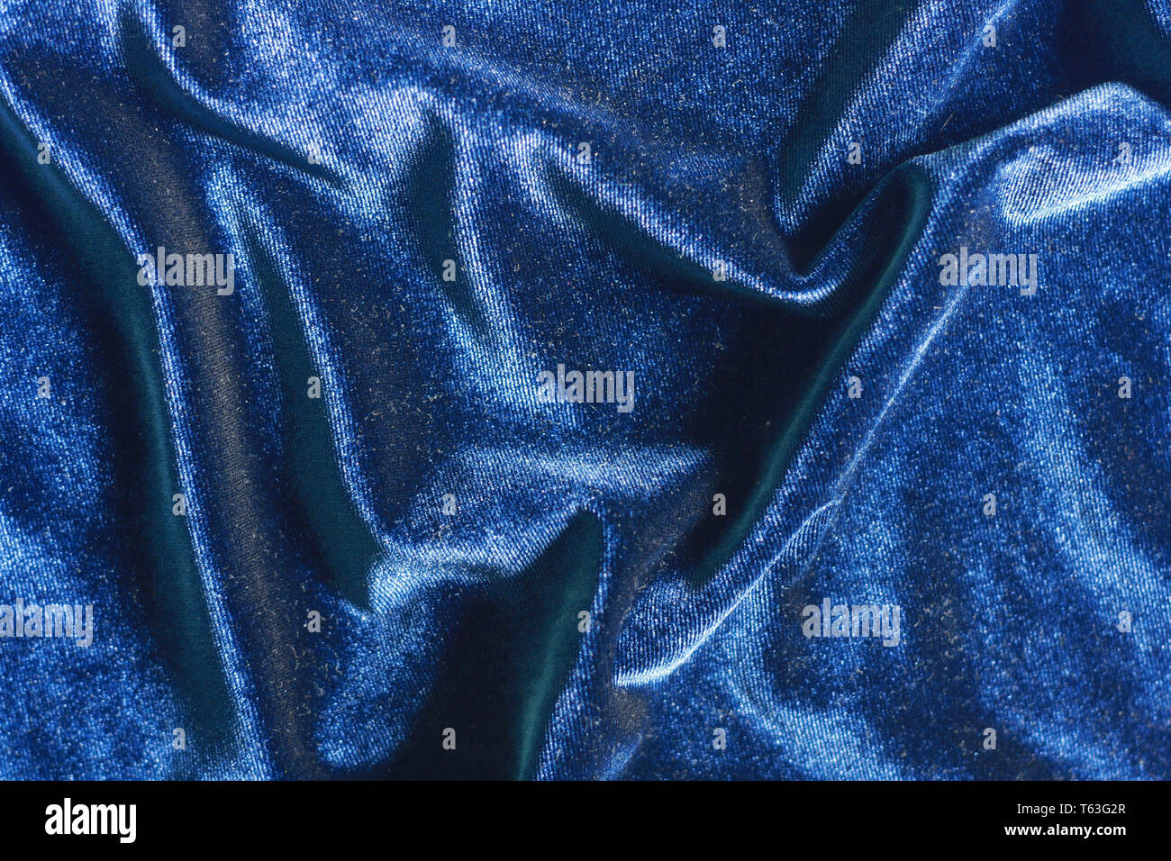 Deep blue shiny velvet folds texture background for design Stock Photo ...