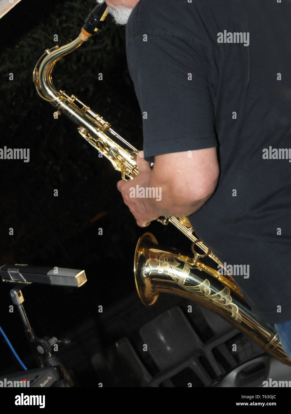 Young man playing the sax hi-res stock photography and images - Alamy