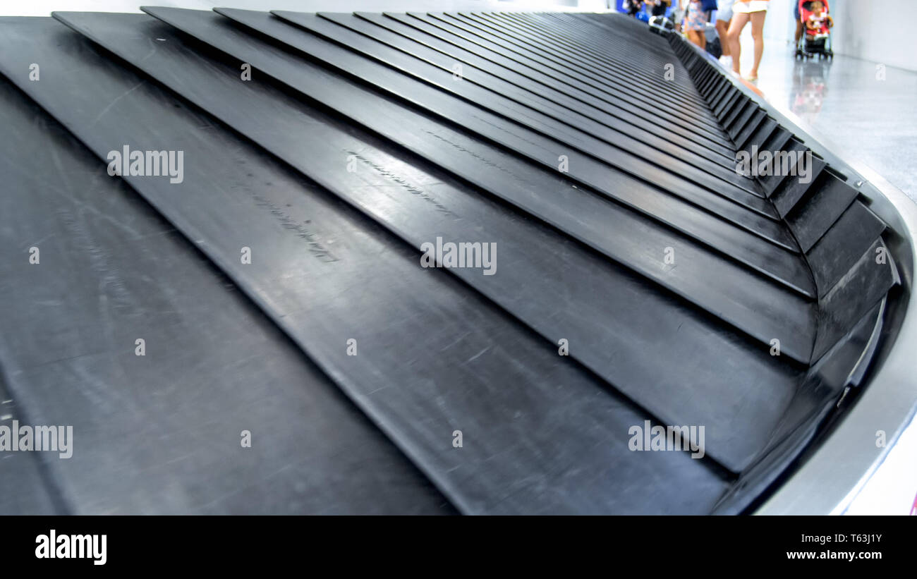 Closeup image of empty luggage conveyor belt in airport Stock Photo - Alamy