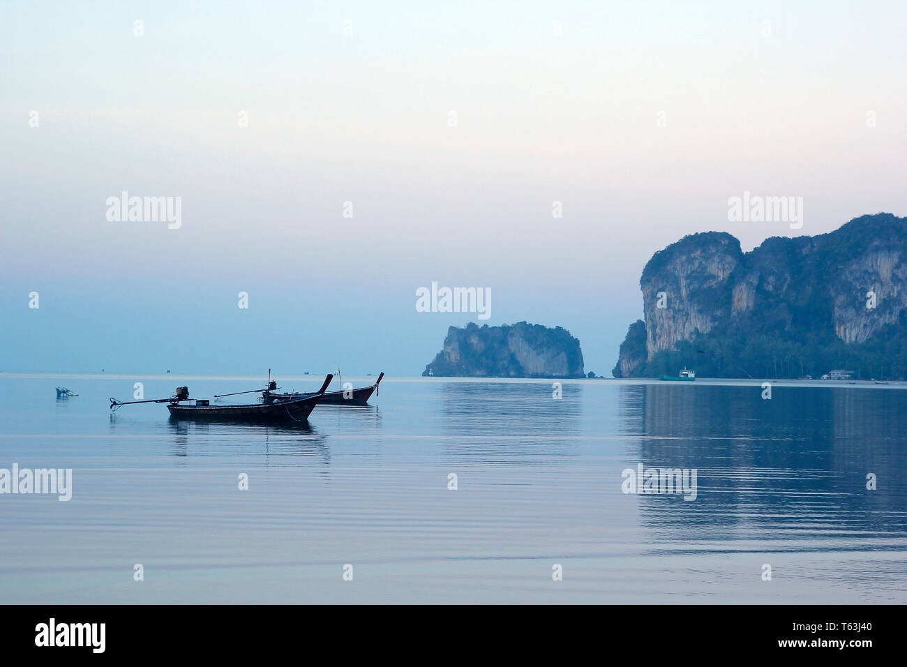 seascape photo of fishing boat in the sea with beautiful sky background ...