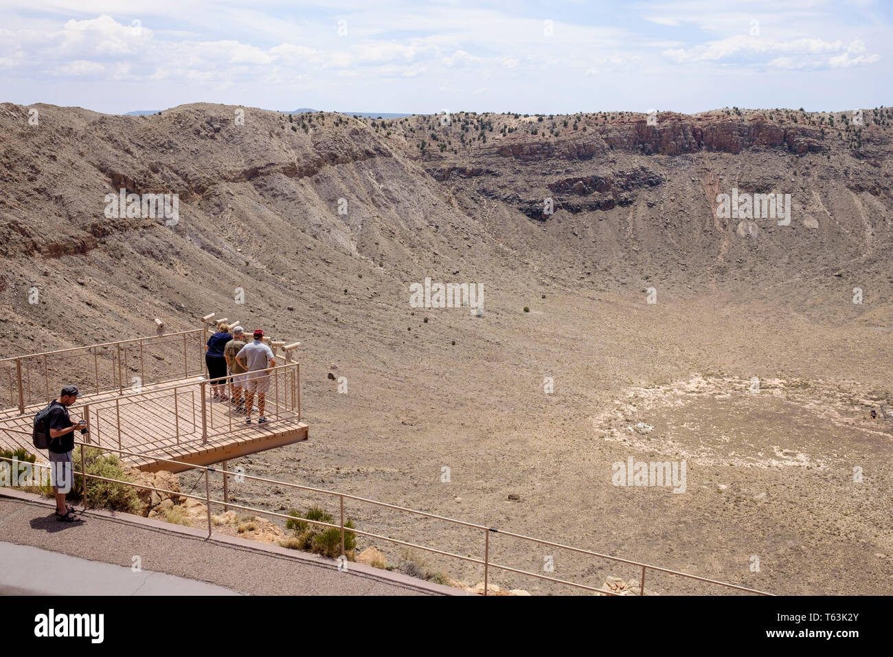 Visitors at Meteor Crater or Barringer Crater at Arizona desert, USA ...