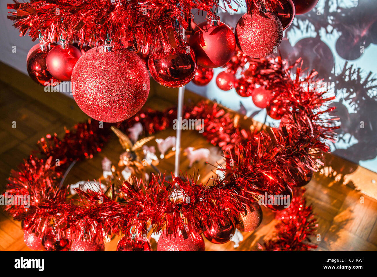 Modern metal spiral Christmas tree decorated with red shiny balls Stock ...