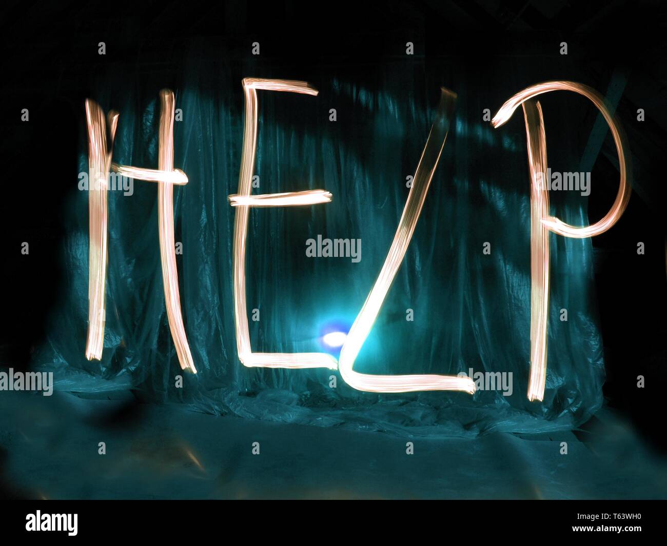 Light graffiti HELP Stock Photo - Alamy