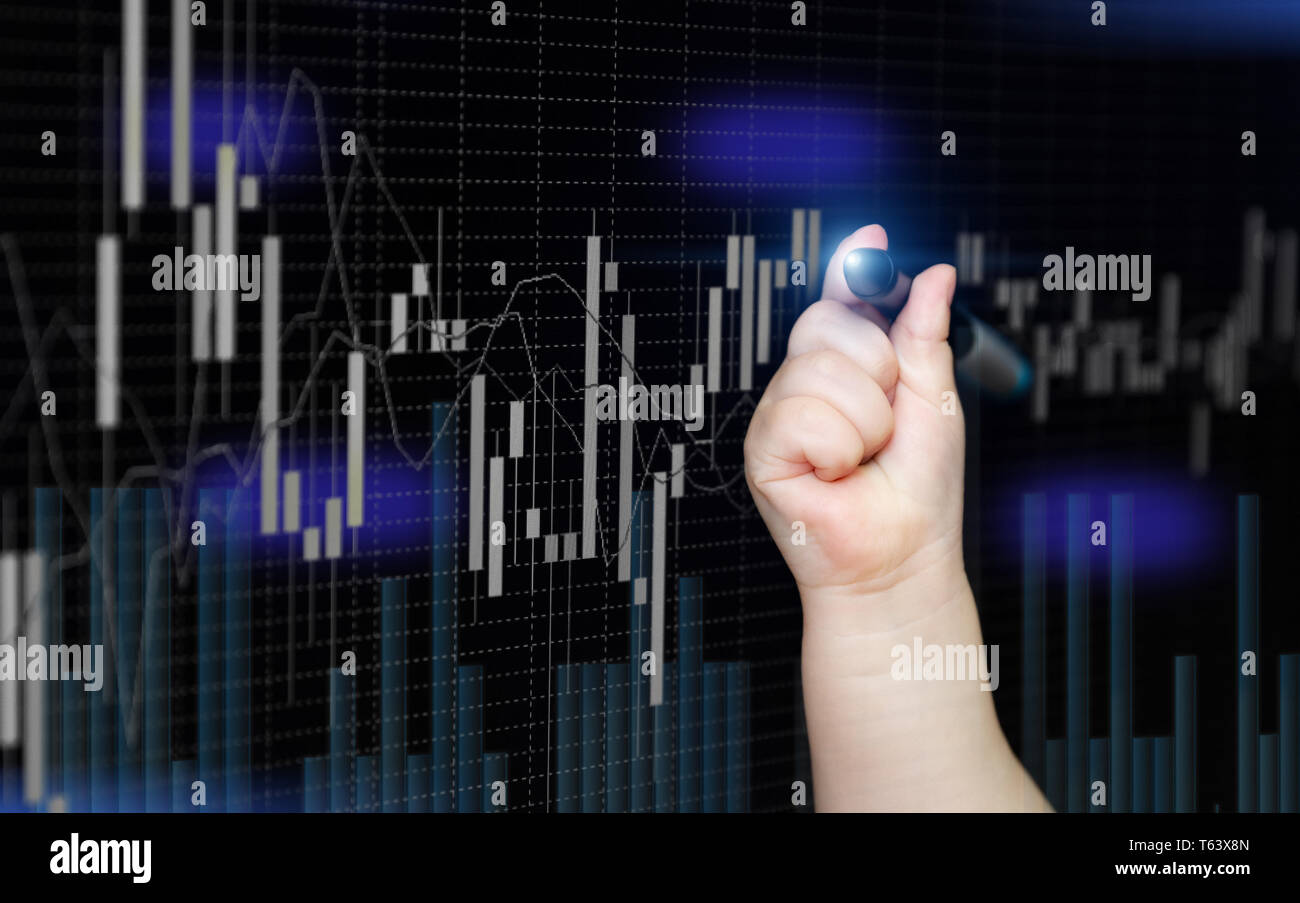 Newborn baby draws on a virtual screen financial charts. Candles forex ...