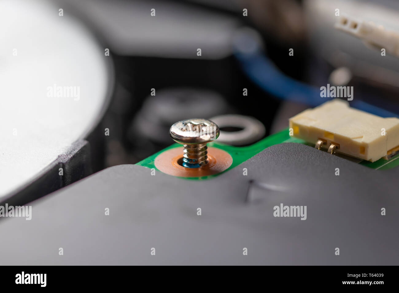 Metal bolt fastening. Computer connector and cable on the processor ...