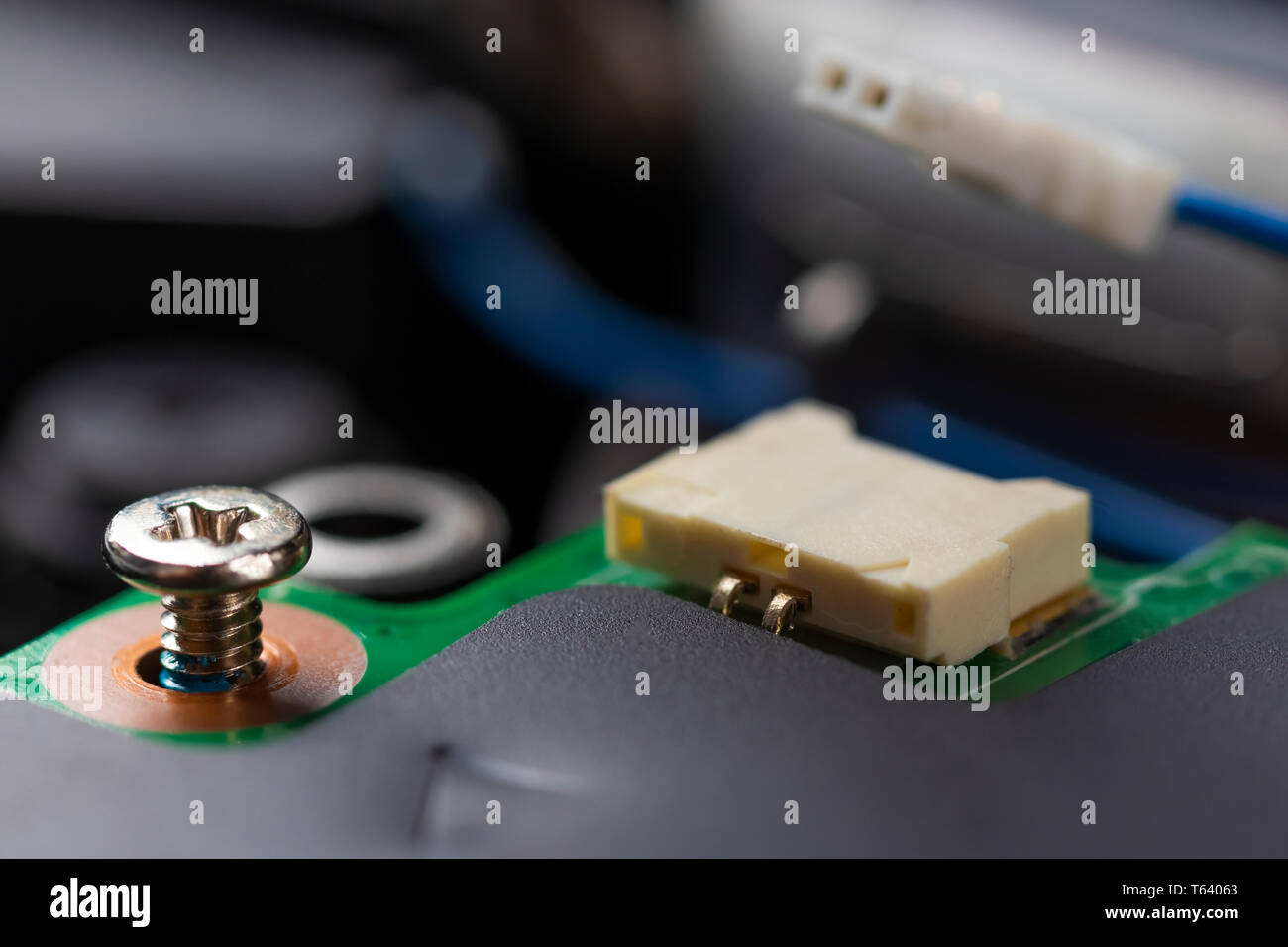 Metal bolt fastening. Computer connector and cable on the processor ...