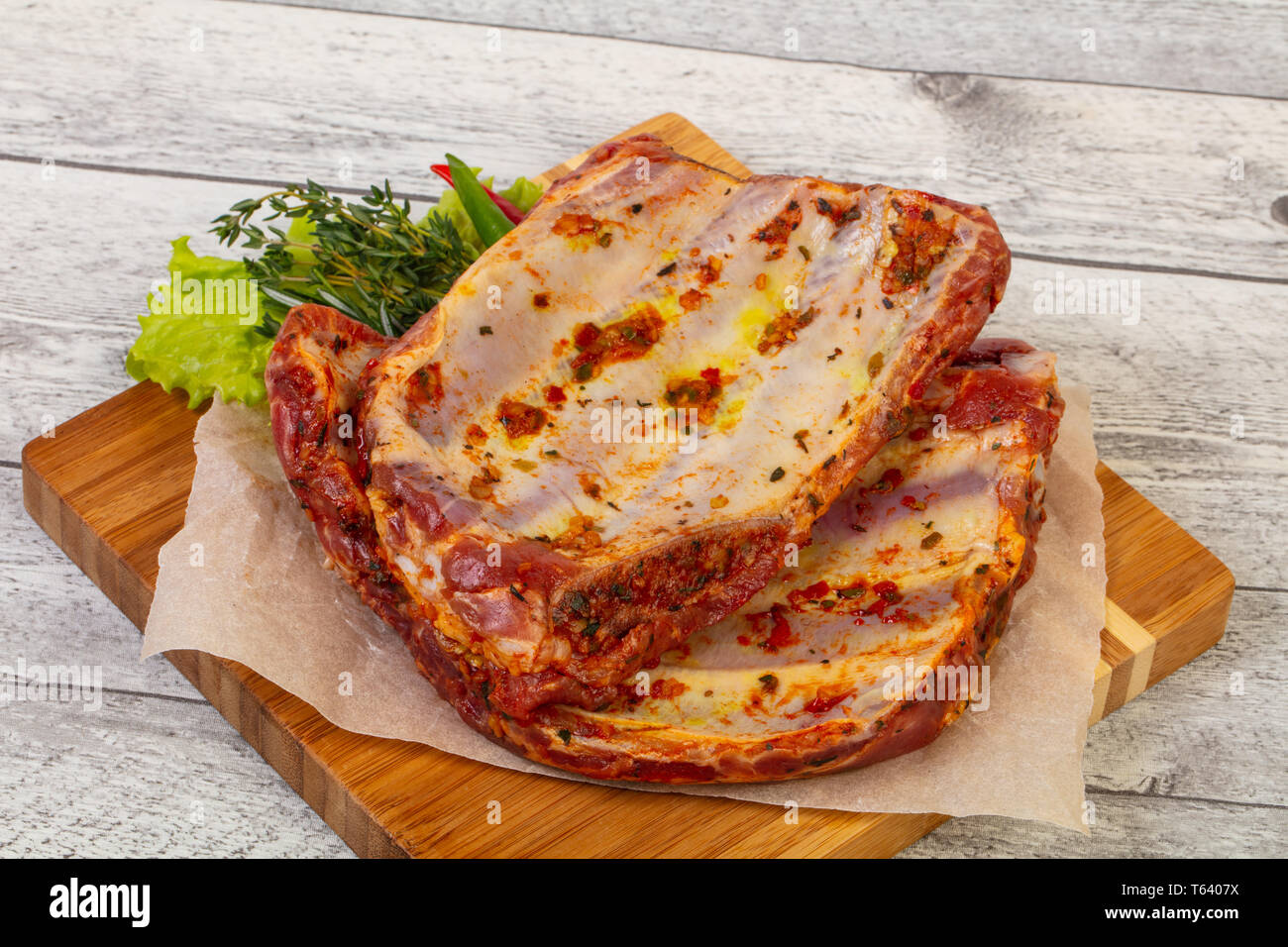 Marinated Raw pork ribs for grill Stock Photo - Alamy