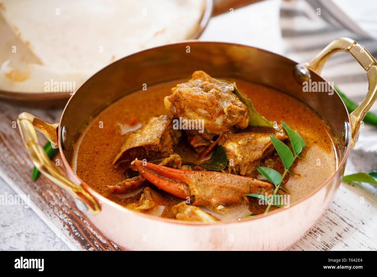 Kerala Spicy Crab curry served with Appam Stock Photo - Alamy