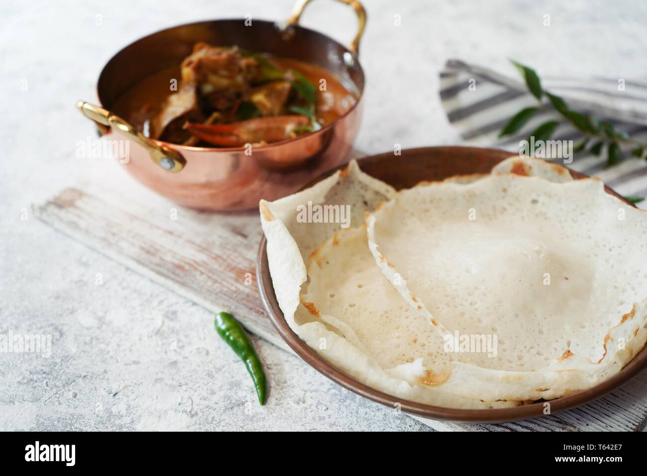 Fish curry with appam hi-res stock photography and images - Alamy