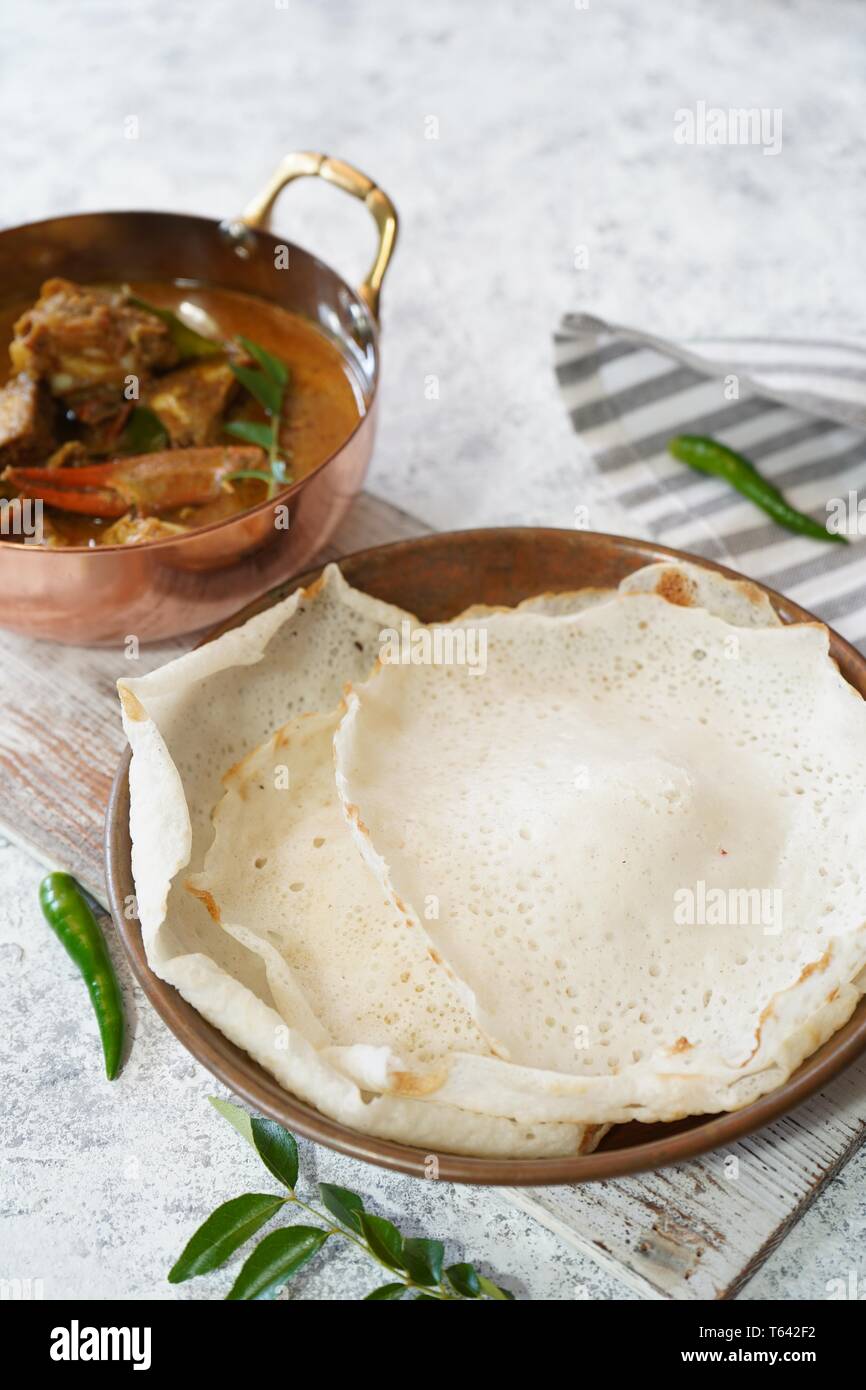 Fish curry with appam hi-res stock photography and images - Alamy