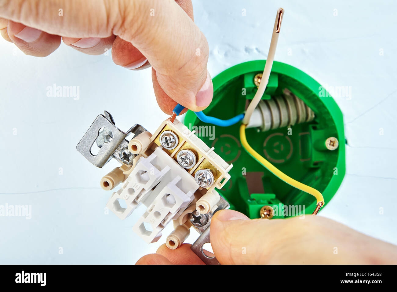 Switch mounting boxes are recessed within finished wall Stock Photo - Alamy