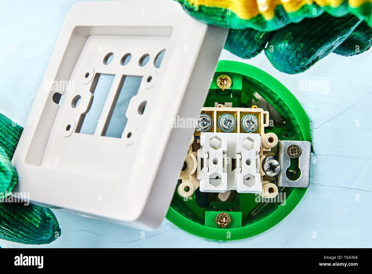 Putting a top on the new european standard push button inside gypsum ...