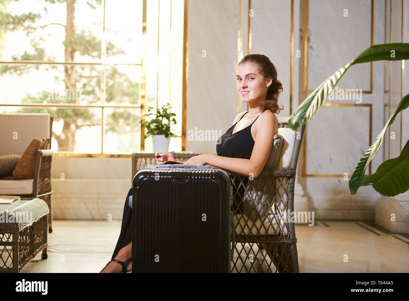 Beautiful woman relaxing sitting hi-res stock photography and images ...