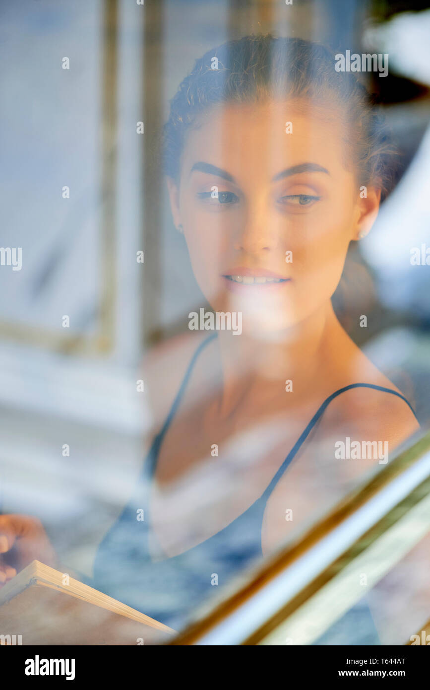 Pretty woman reading book Stock Photo - Alamy