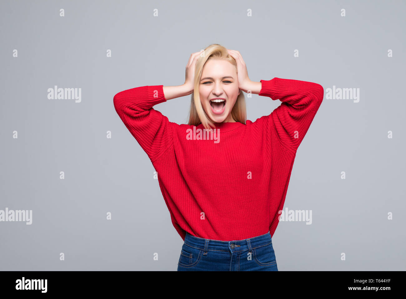 Young pretty blonde girl shouting aloud isolated on white Stock Photo ...