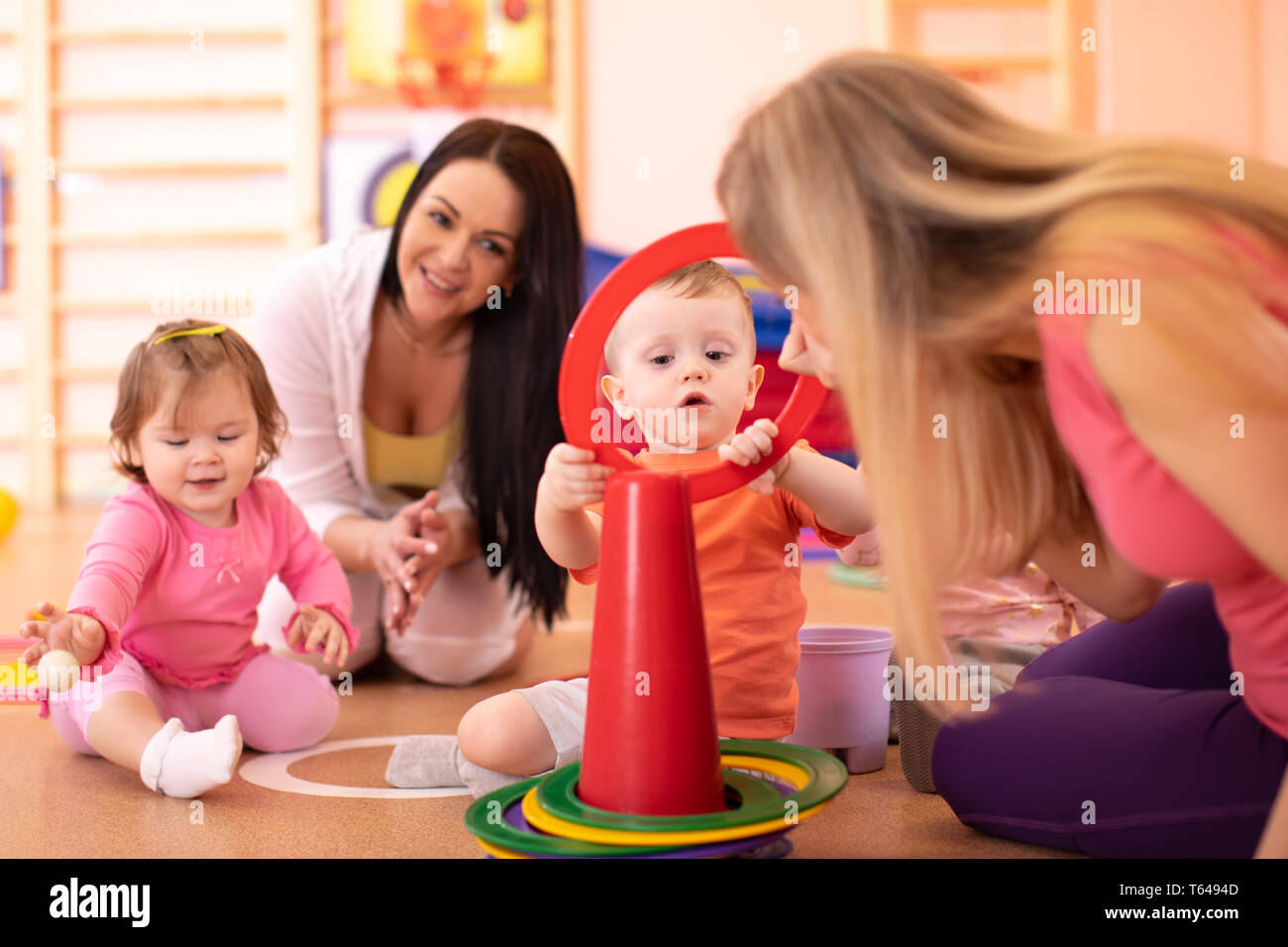 Nursery Babies Group Having Fun In Kindergarten Gym Stock Photo Alamy nursery-babies-group-having-fun-in-kindergarten-gym-stock-photo-alamy