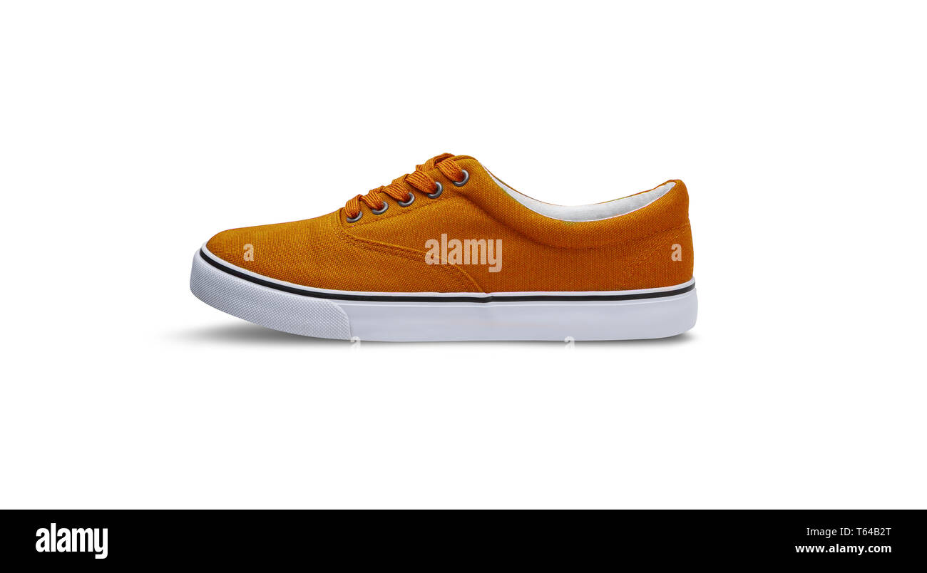 Orange canvas shoes isolated on white background with clipping path ...