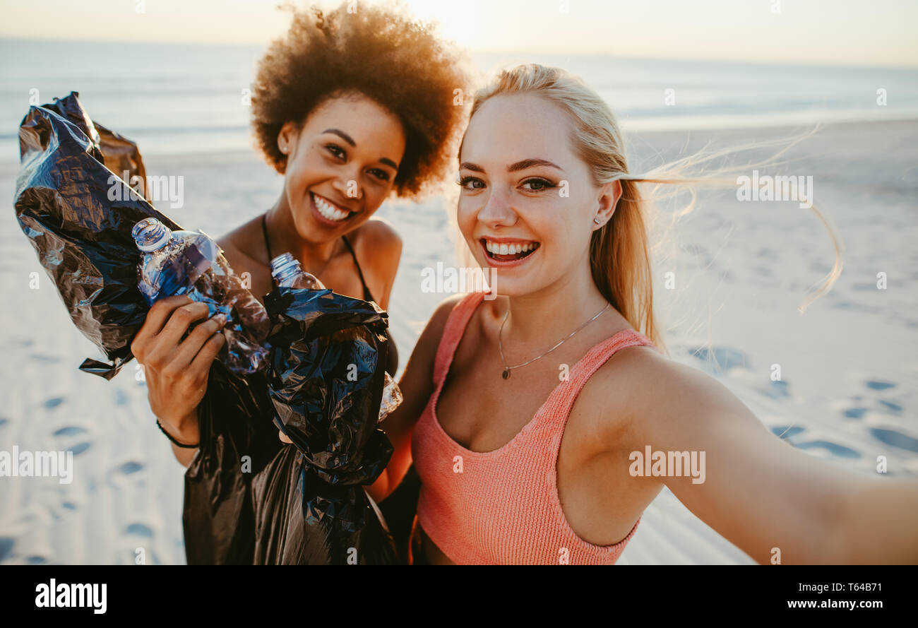Collecting rubbish bags hi-res stock photography and images - Alamy