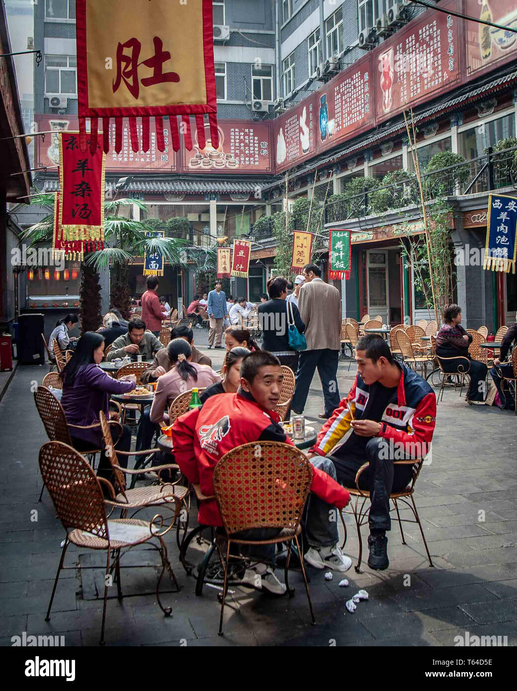 Beijing, China. 18th Oct, 2006. People eating in the food court of the ...