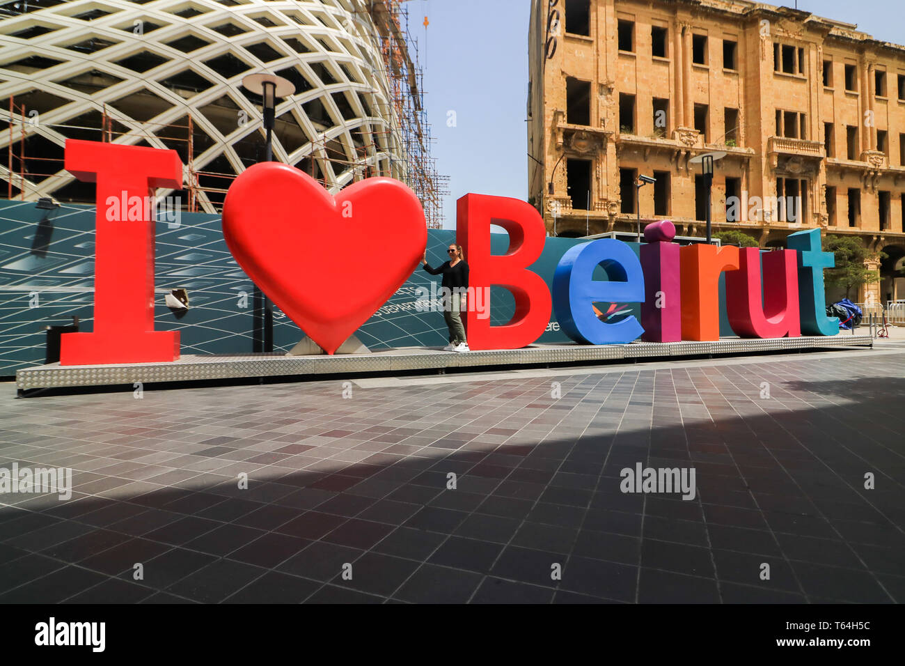 Beirut, Lebanon. 29th Apr, 2019. A woman poses on "I Love Beirut" sign ...