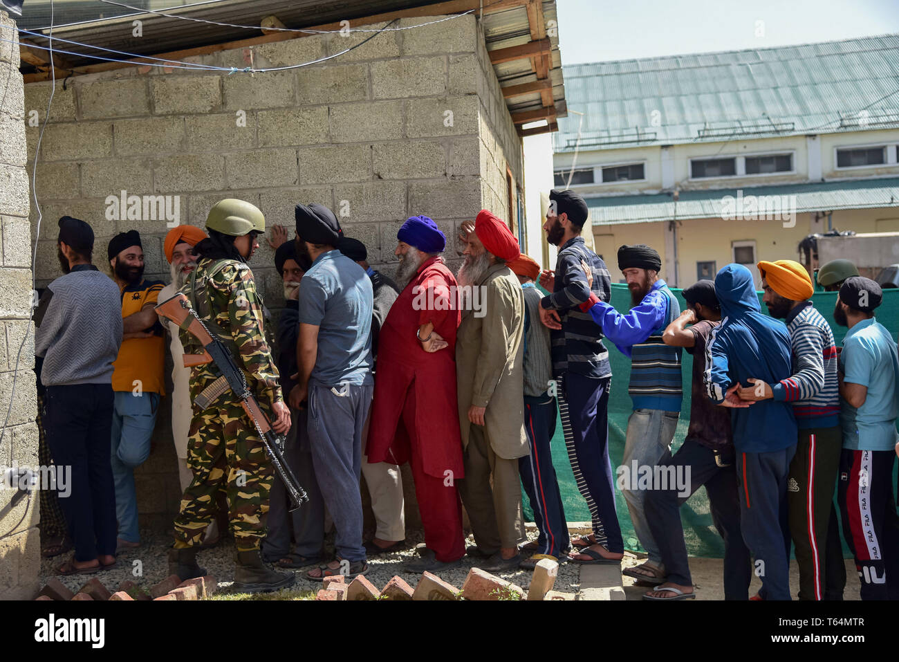 Indian elections queue hi-res stock photography and images - Alamy
