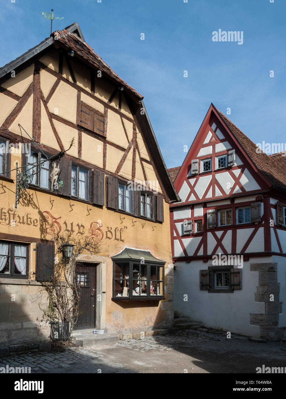 Historic colorful half-timbered houses in the medieval town Rothenburg ...