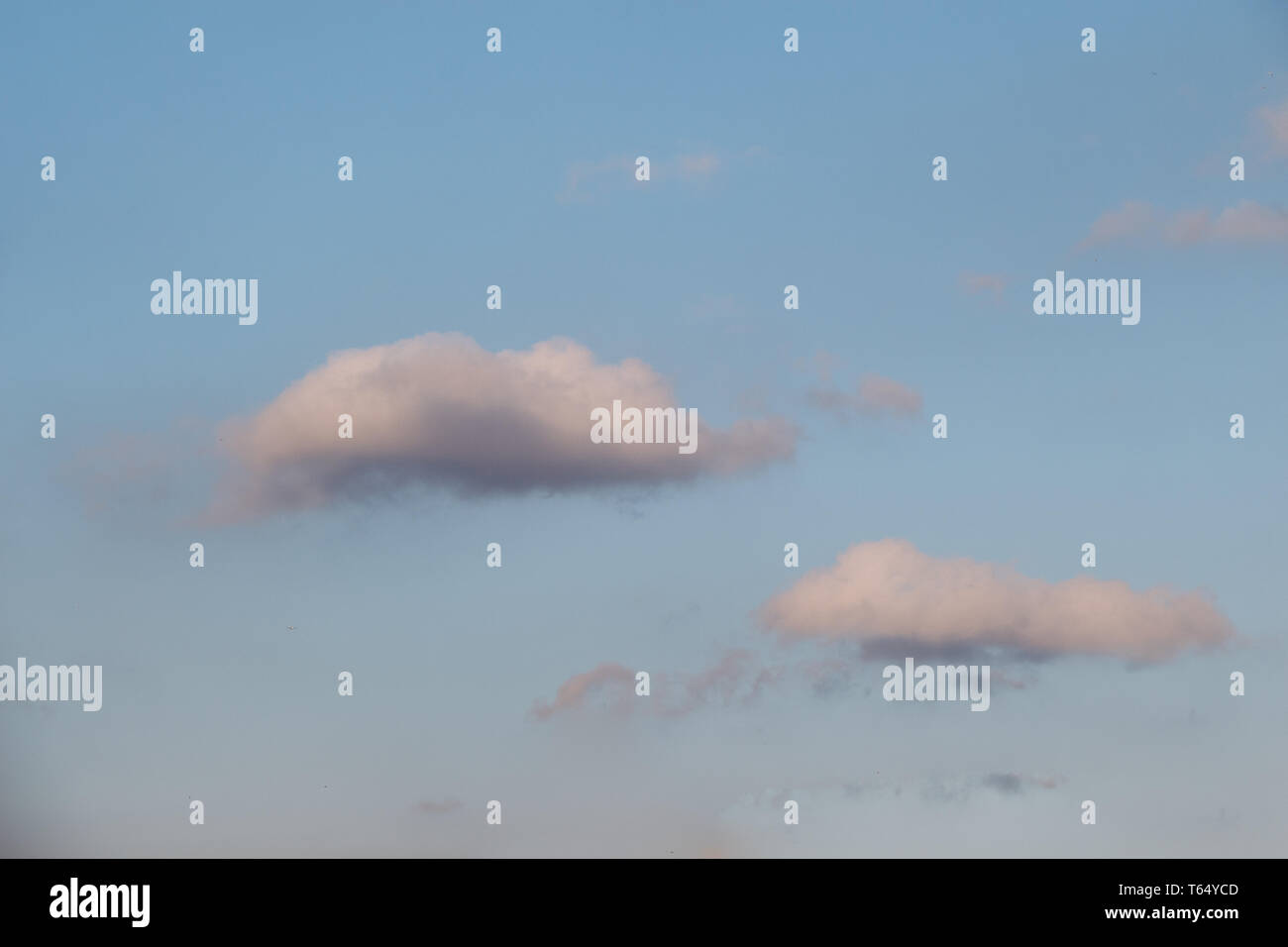Blue Sky is partly filled with white clouds Stock Photo - Alamy
