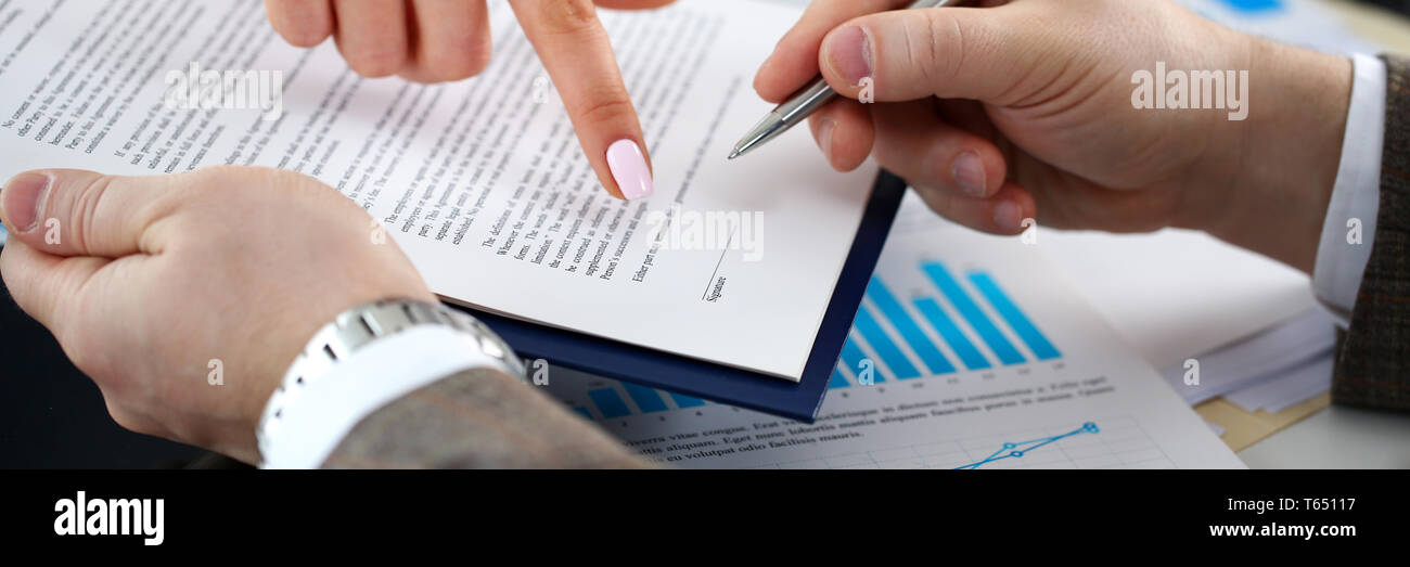 Female arm offer contract form on clipboard pad Stock Photo - Alamy