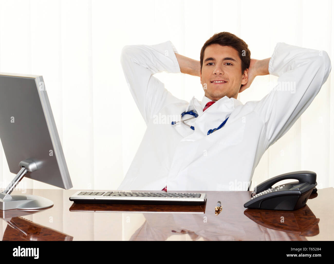 Doctor at work Stock Photo - Alamy