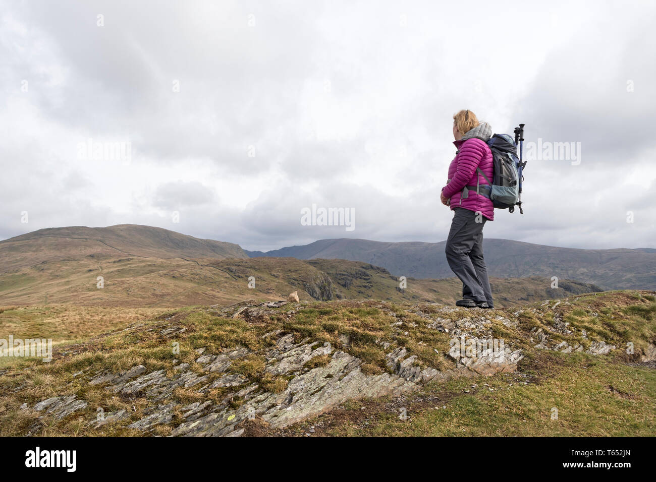 Walker on the Summit of Sallows with the View Towards the Kentmere ...