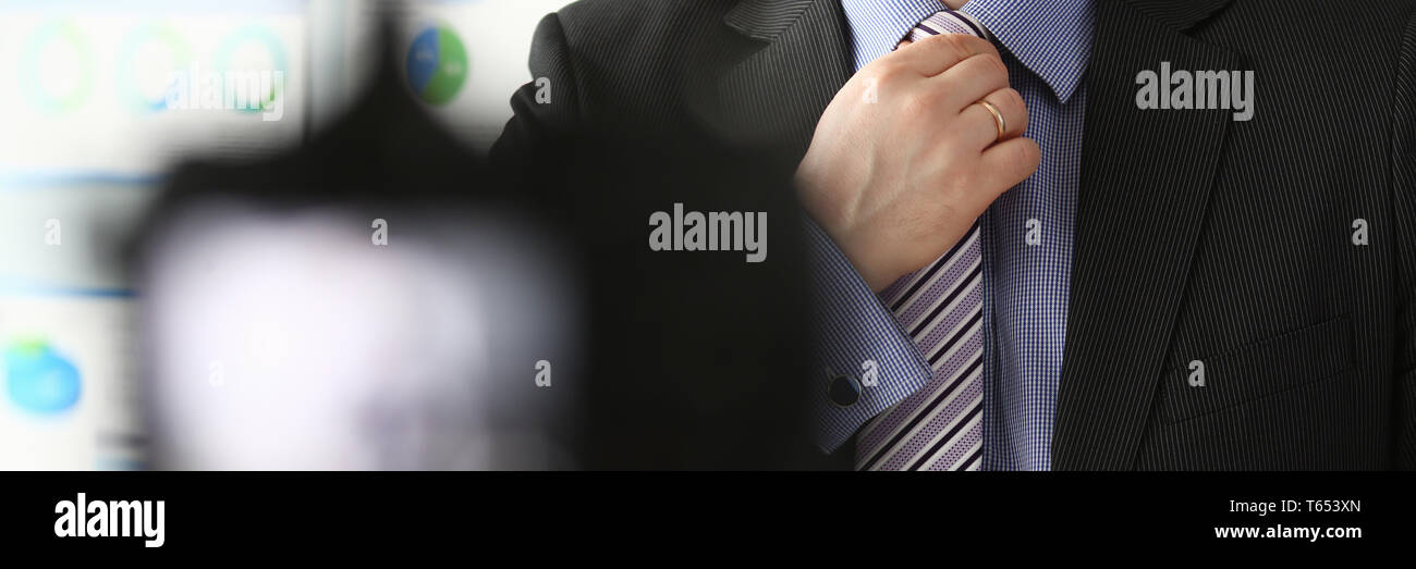 Male arm in blue suit set tie closeup on Stock Photo - Alamy