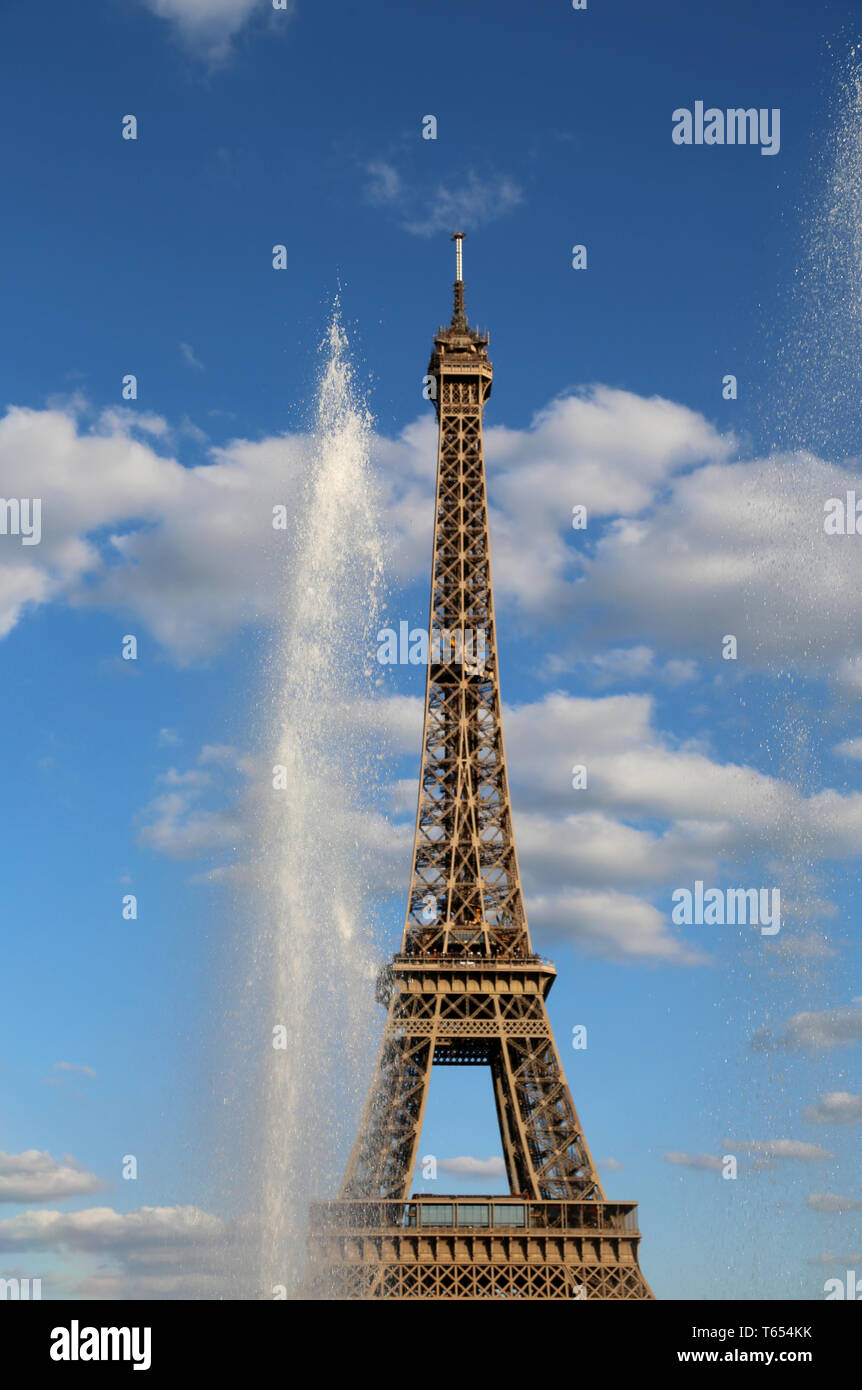 Eiffel Tower in Paris France with clouds on the sky and the water of the fountains Stock Photo ...