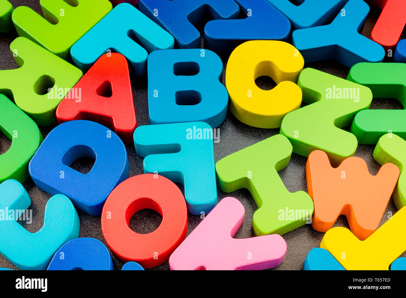 Colorful Letters of Alphabet made of wood Stock Photo - Alamy