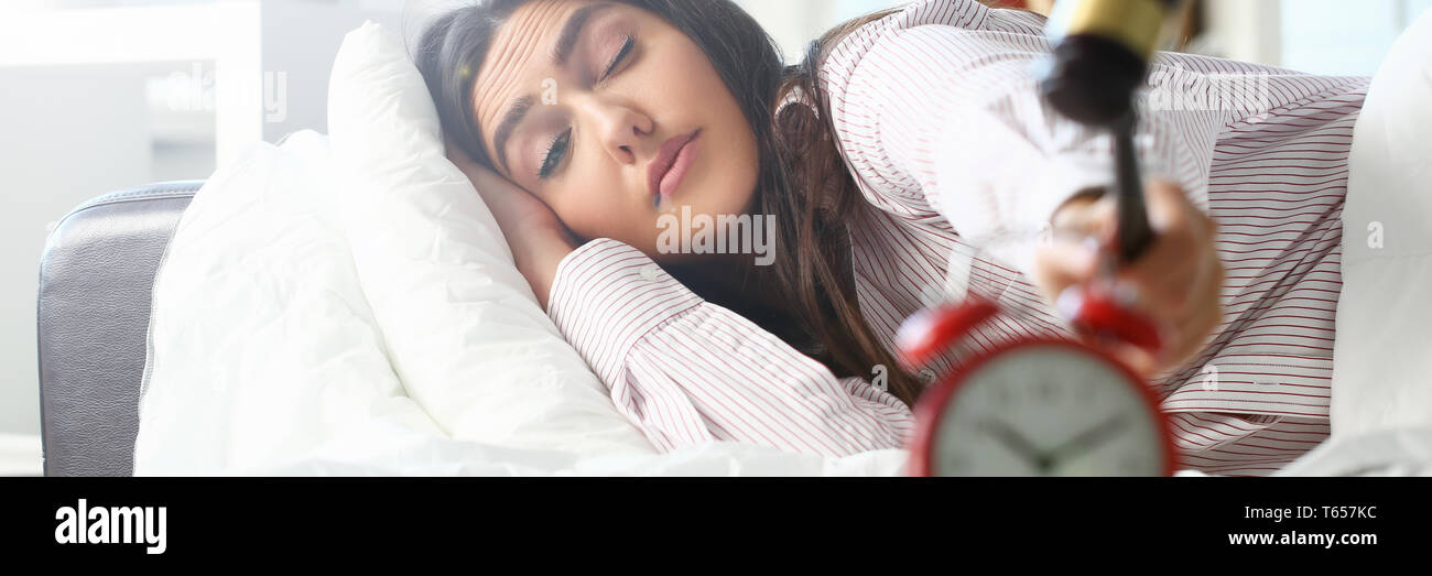 Sleepy young woman portrait with one Stock Photo - Alamy