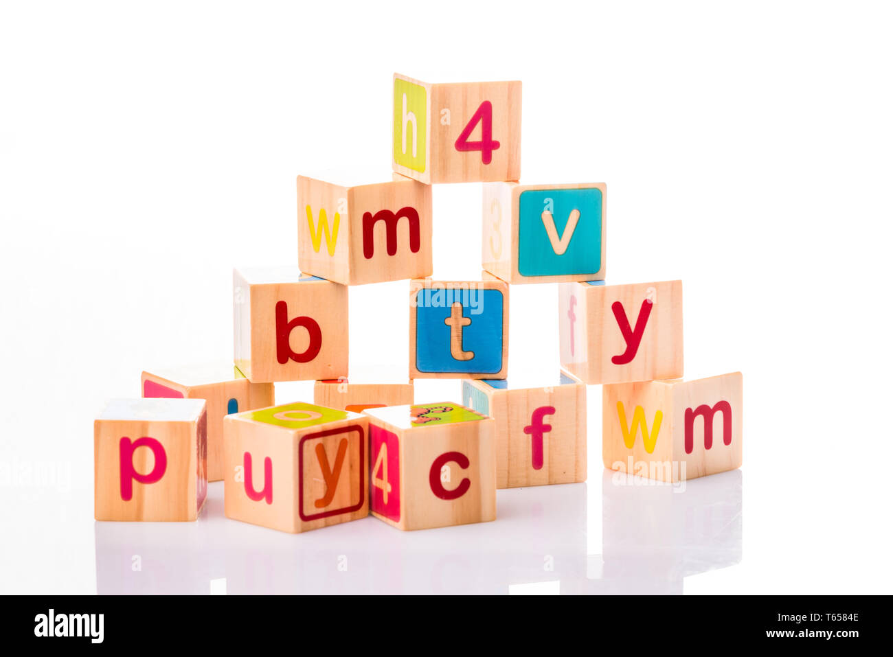 Toy cubes. Baby collection. ABC letters made from baby toys Stock Photo ...