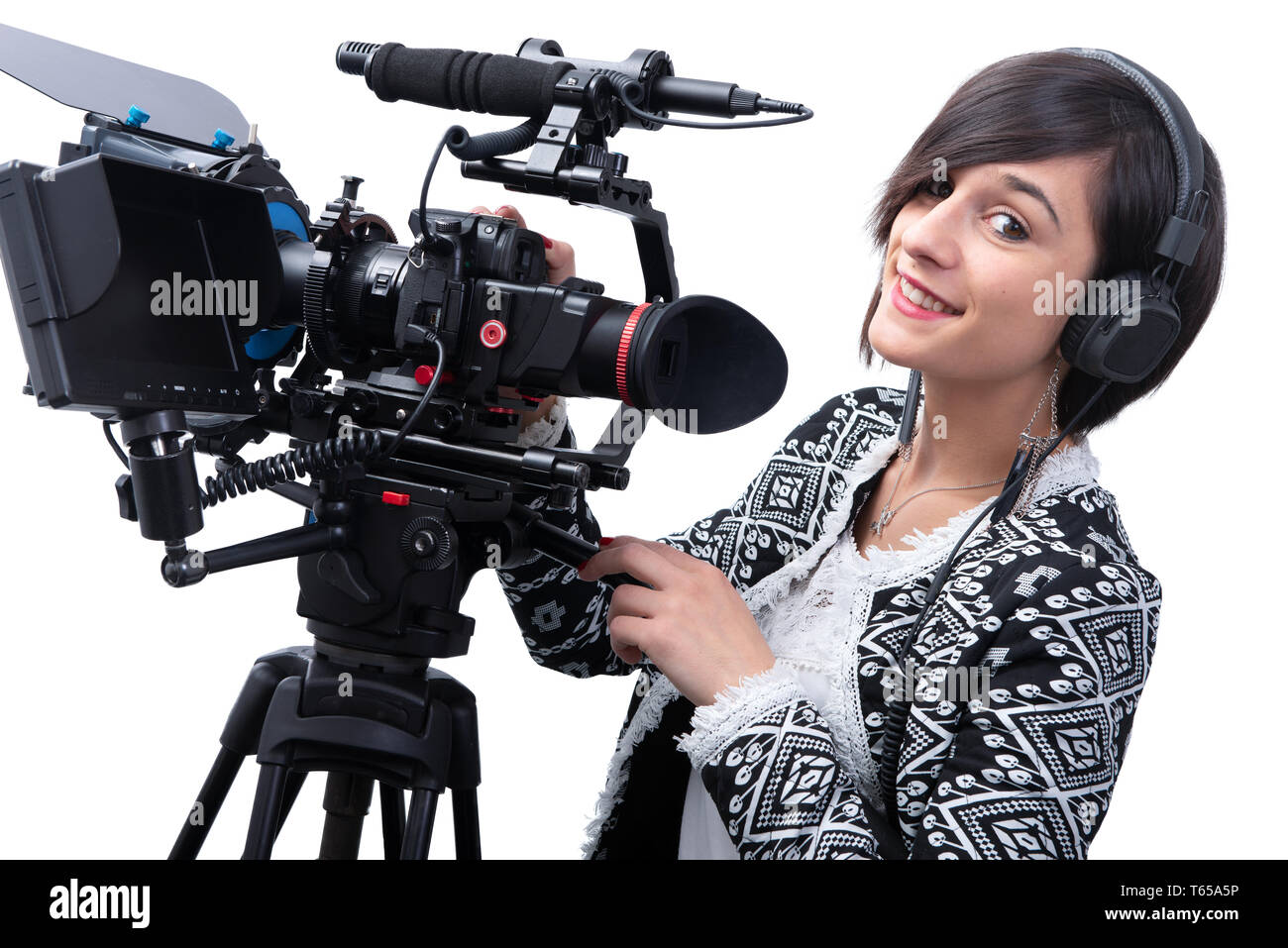 young woman with professional video camera, dslr, isolated on the white ...