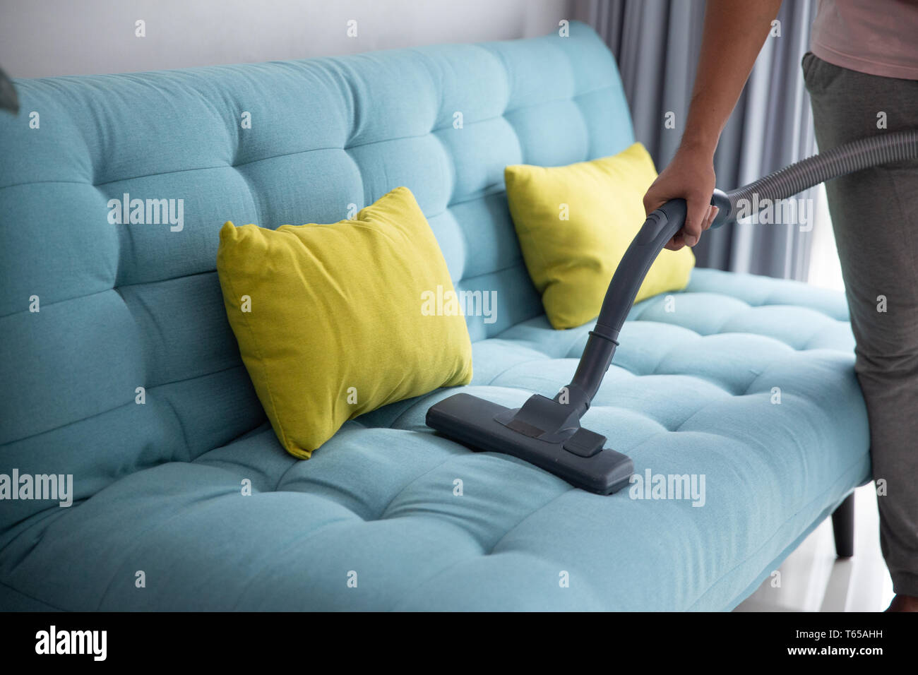 Man using vacuum cleaner hi-res stock photography and images - Alamy