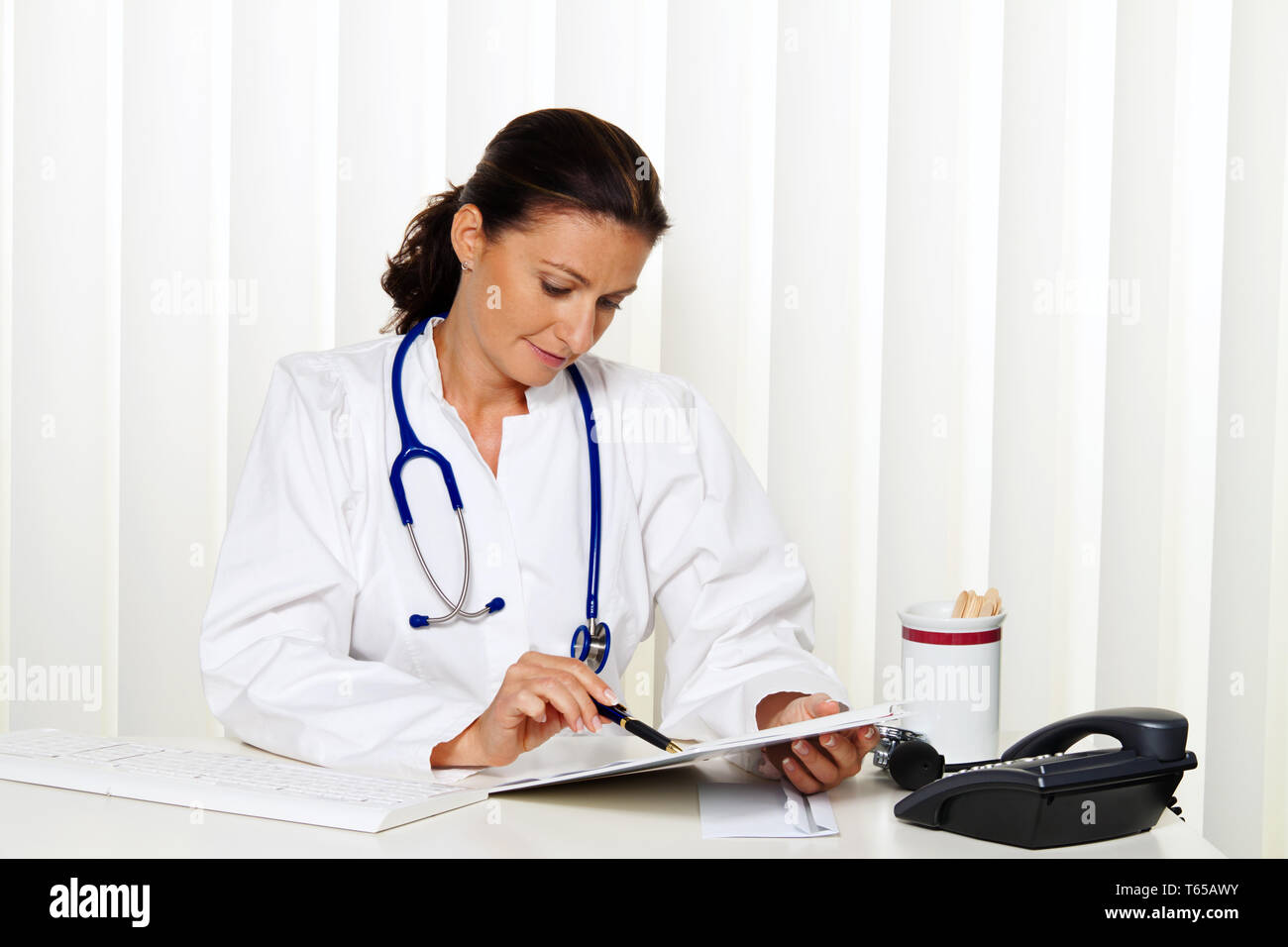 Doctor at work Stock Photo - Alamy