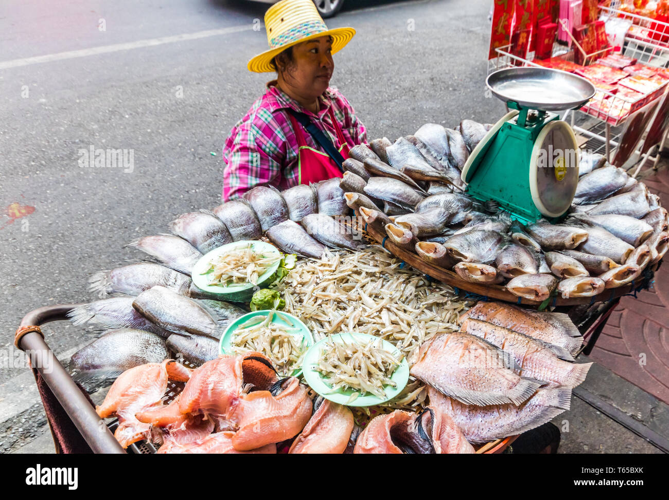 Bangkok, Thailand - January 31st 2019: Dried fish vendor on Yaowarat road. There are many such ...