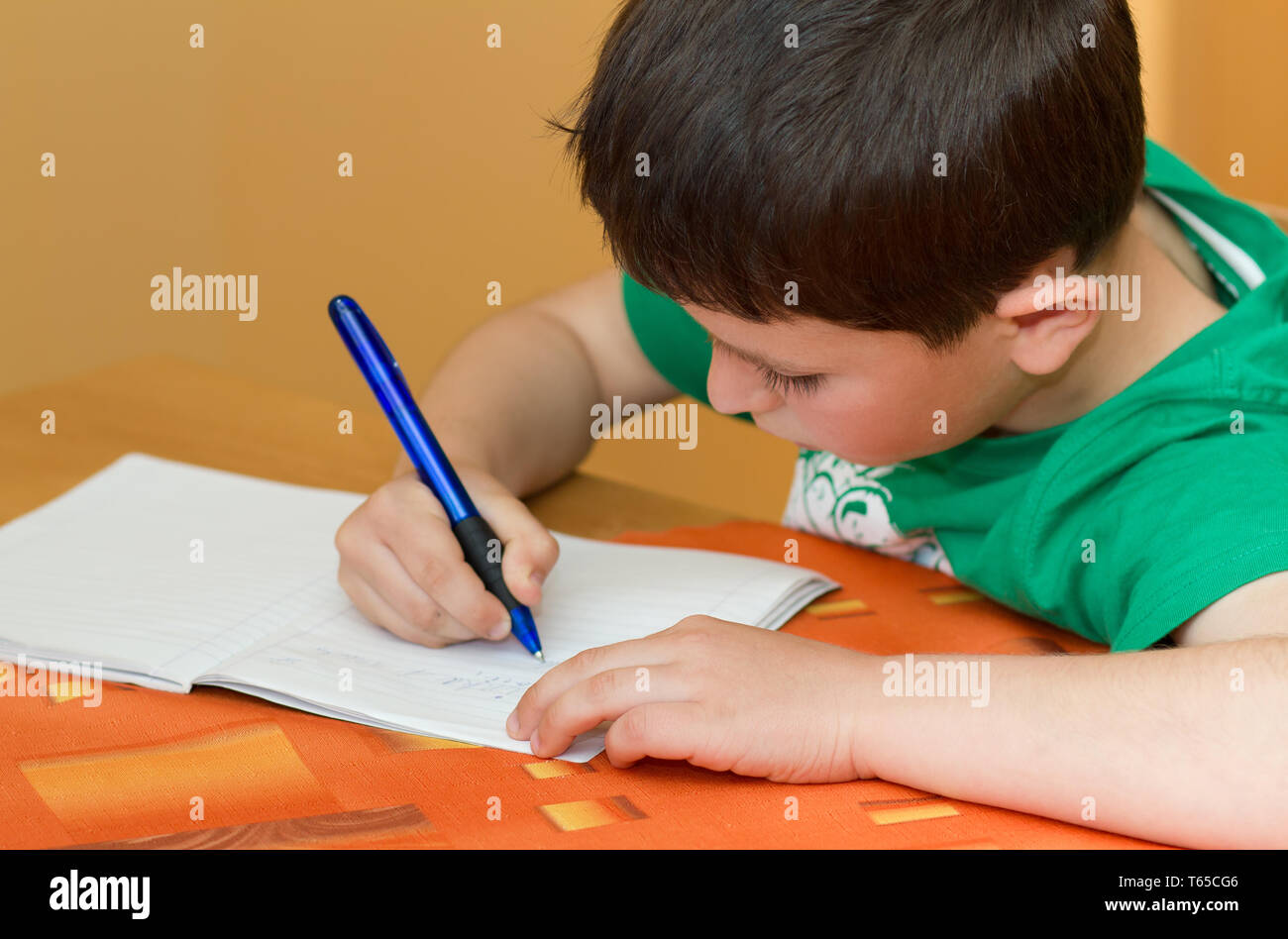 Boy writting school hi-res stock photography and images - Alamy