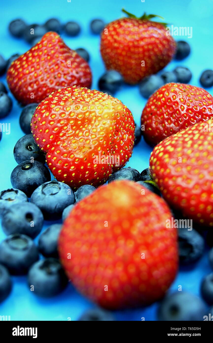 Strawberries and blueberries Stock Photo - Alamy