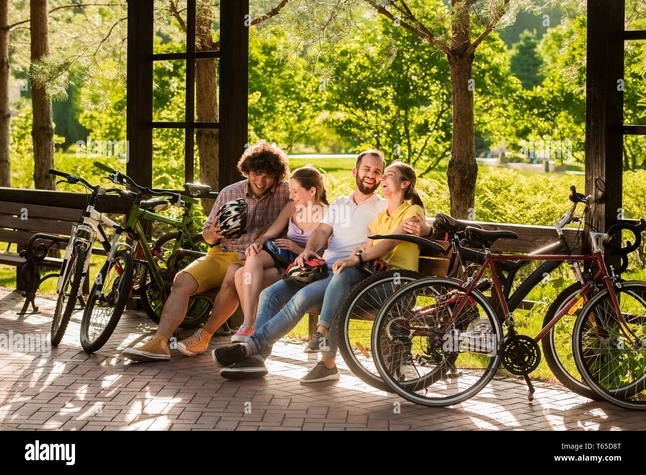 Young joyful people resting outside Stock Photo - Alamy